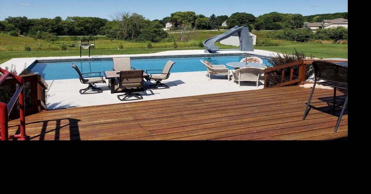 New in-ground heated salt water pool complete with a slide and ...