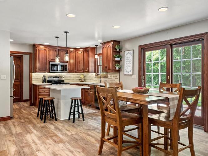 Dream kitchen with tile backsplash, quartz countertops, walk-in pantry ...