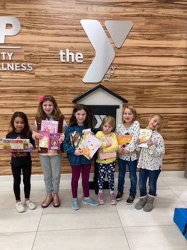 Girl Scouts install Little Free Library at YMCA | News | shelbynews.com