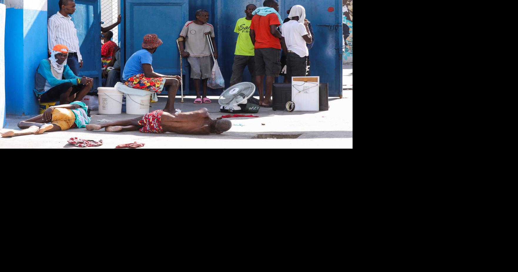 Haiti orders a curfew after gangs overrun its two largest prisons ...