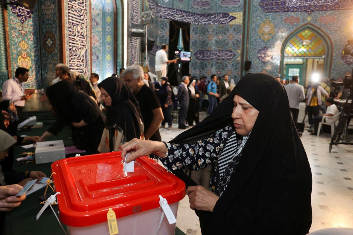 Iran Holds Runoff Presidential Vote Pitting Hard Liner Against