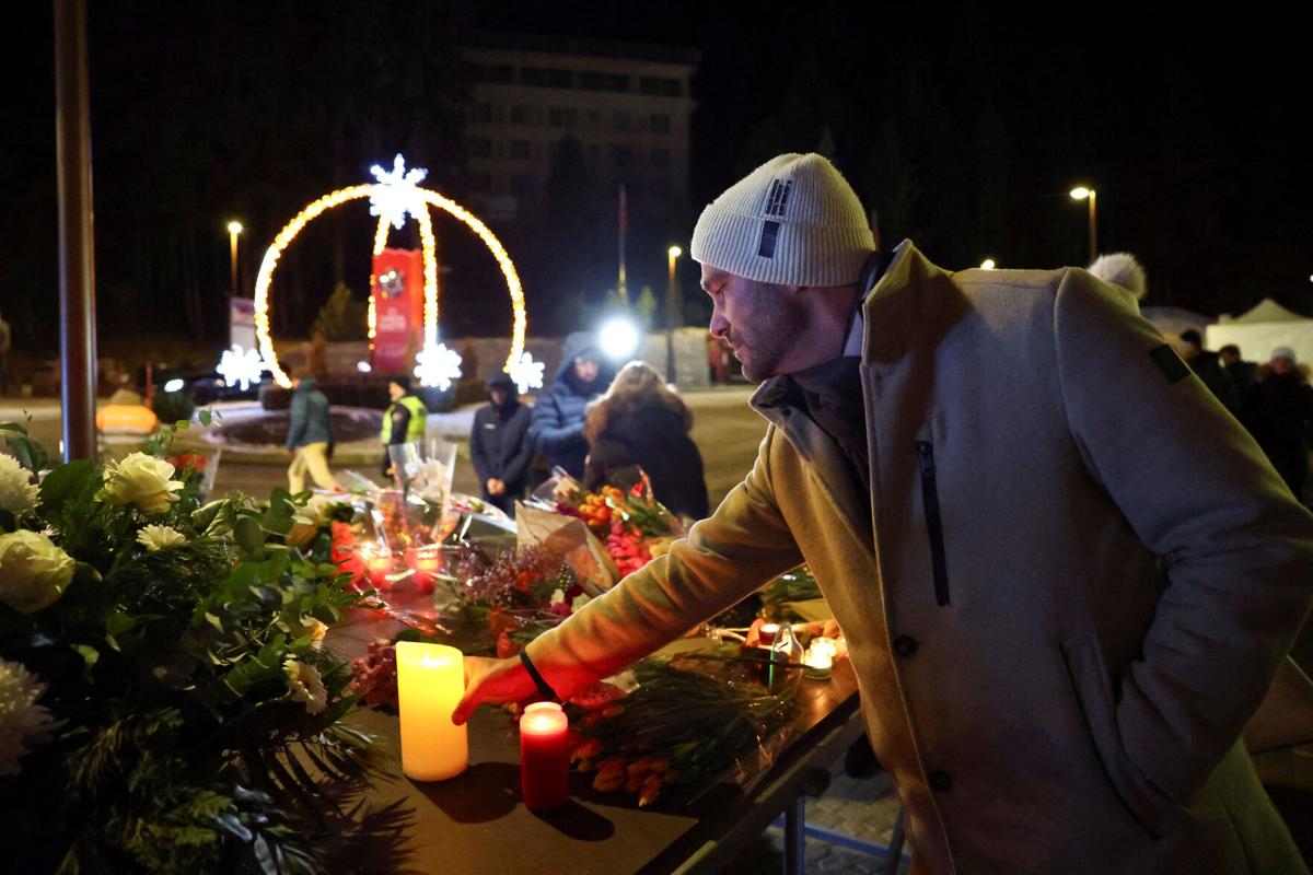 Swiss investigators believe sparkling candles atop wine bottles ignited ...