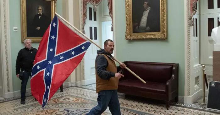 Confederate flag-toting man, son convicted in Capitol riot | National ...