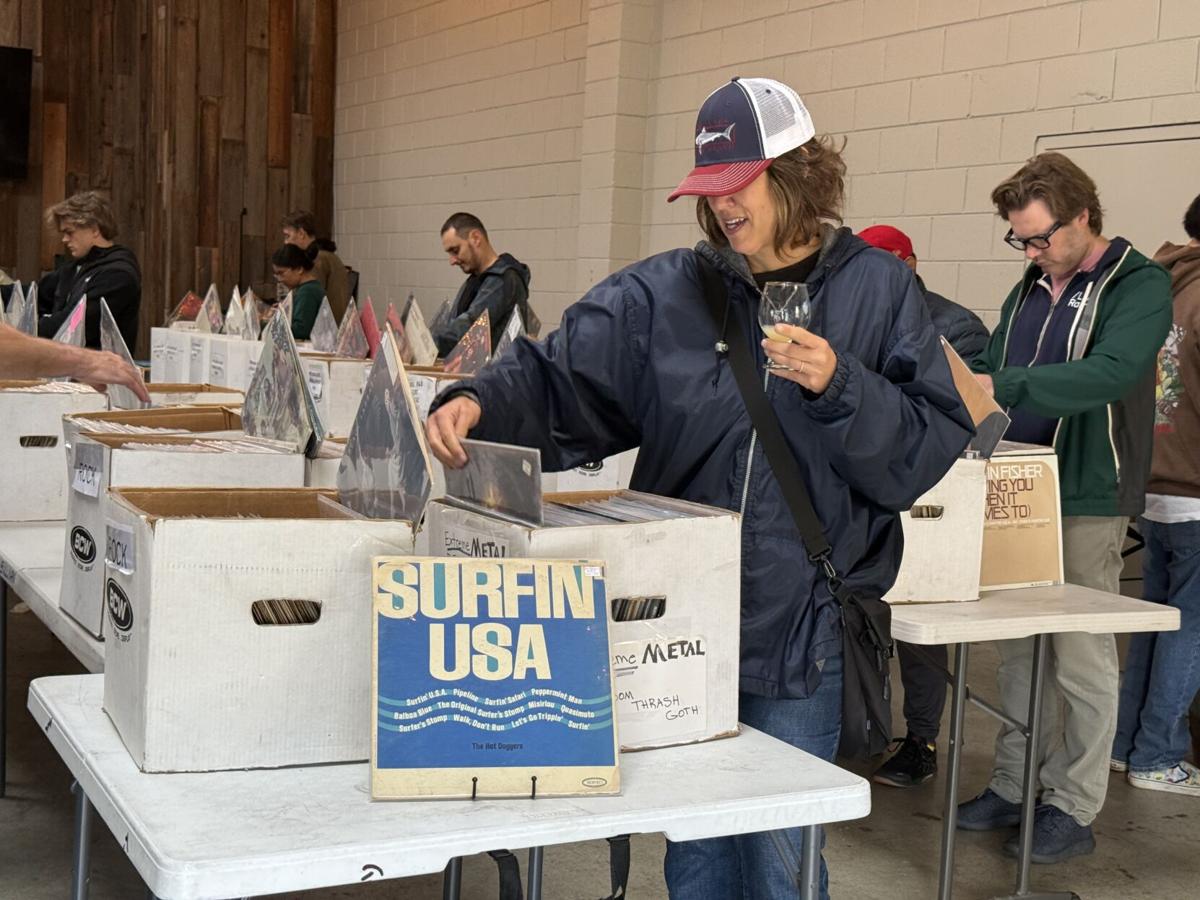 Browsing records with a beer | Local News | smdailyjournal.com