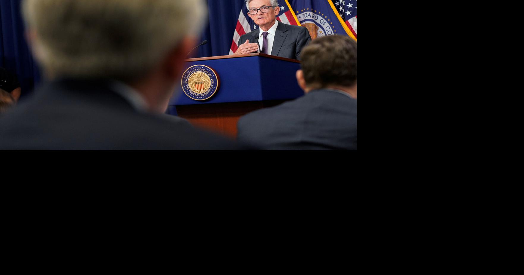 Federal Reserve sees tariffs raising inflation this year, keeps key ...
