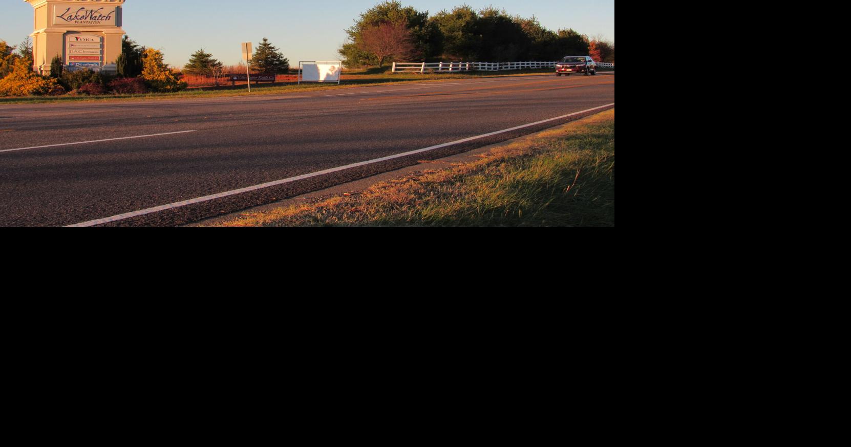 Business owners push to bring down the berm