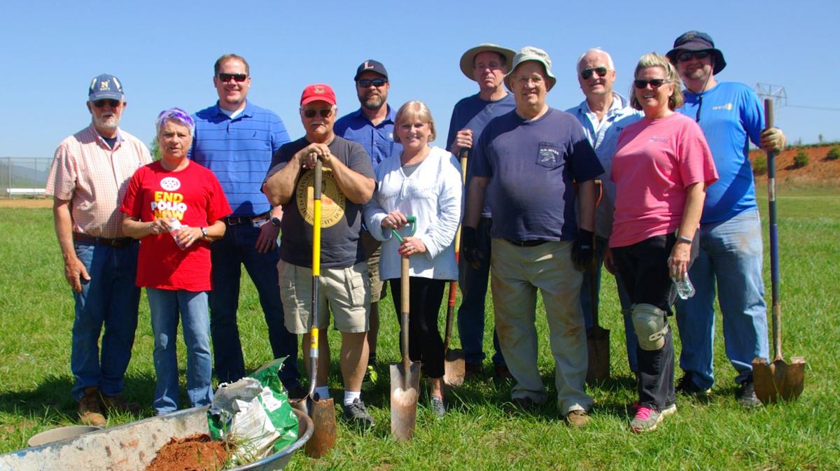 Rotary Club plants trees for Arbor Day