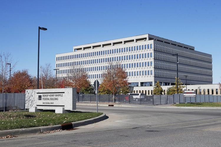 Campaigners protest ICE activity in Bishop Henry Whipple Federal ...