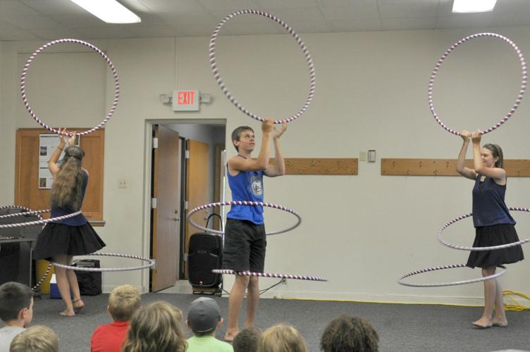 Family of hula enthusiasts dazzle children at Le Center Library | News ...