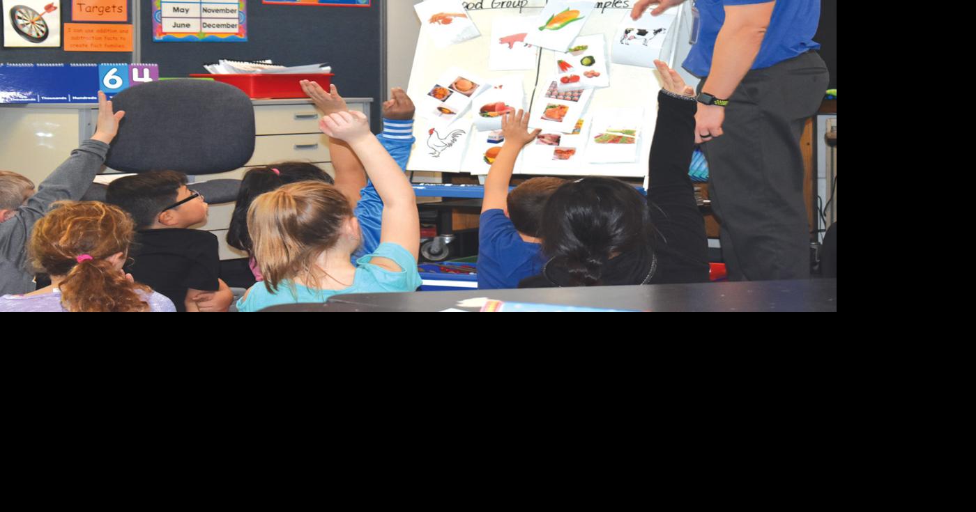 Tanner Lange, intern with district's nutrition services dept ...