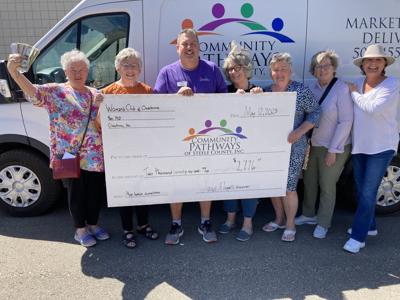 The Woman’s Club of Owatonna presents check to Community Pathways ...