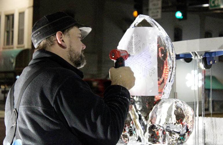 Ice sculptor carves fleur-de-lis downtown | News | southernminn.com