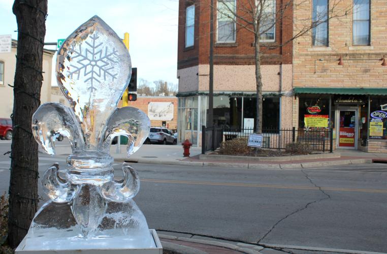 Ice sculptor carves fleur-de-lis downtown | News | southernminn.com