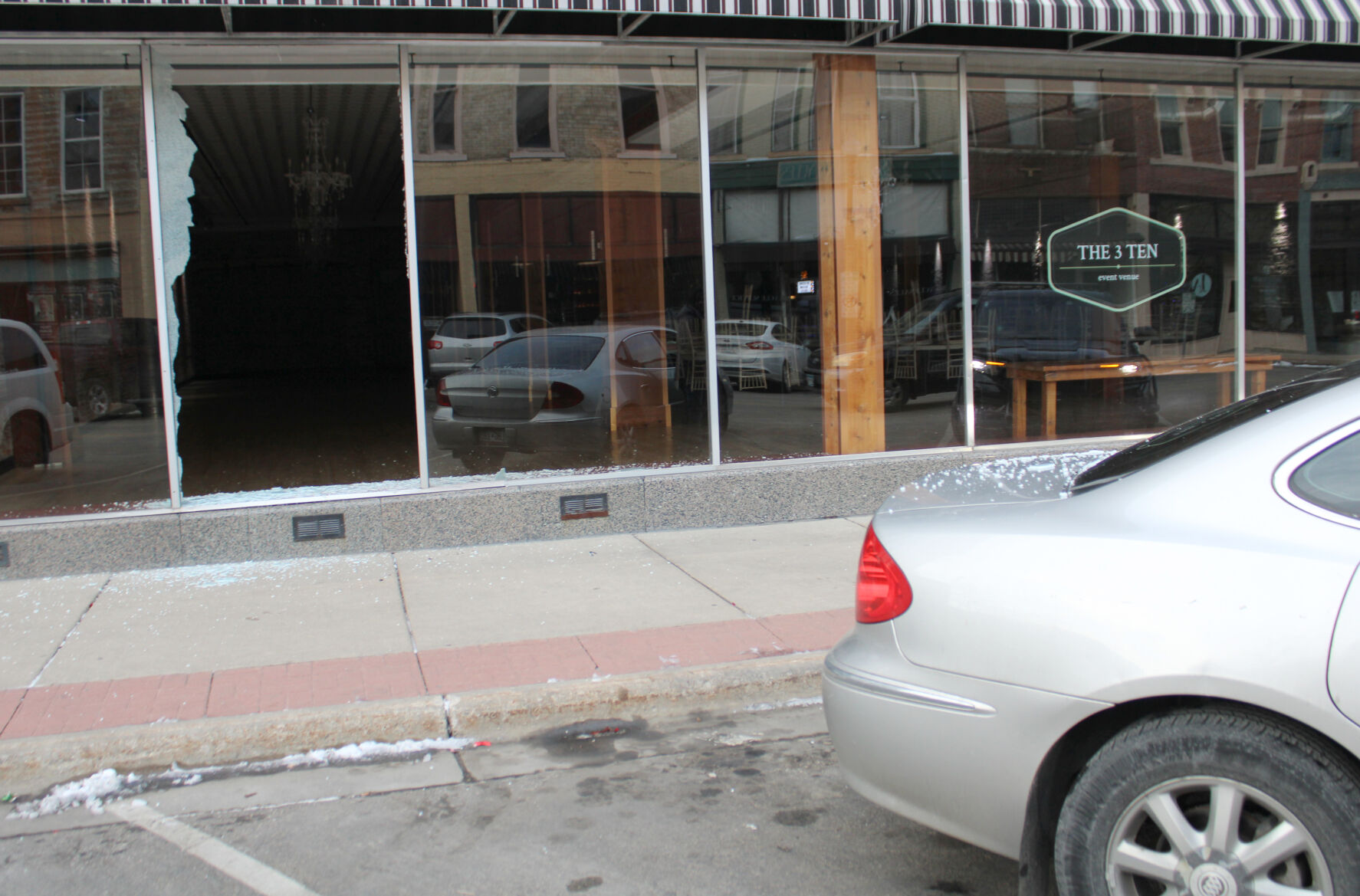 Car crashes through window of downtown business again | News ...