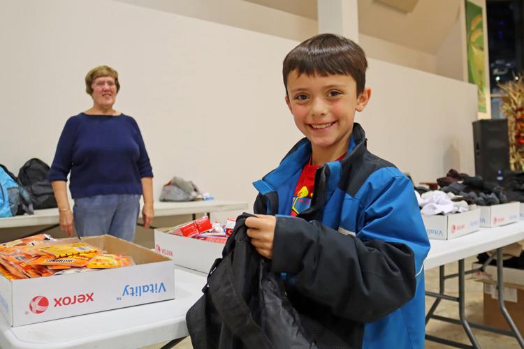 Church volunteers pack winter emergency kits | News | southernminn.com