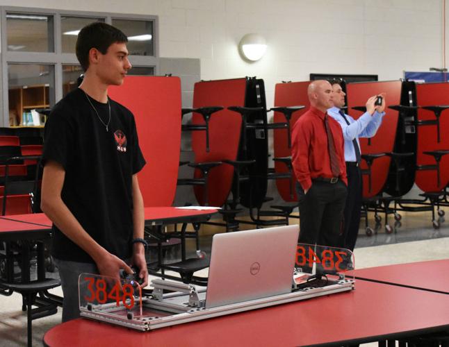 School Board votes to reduce IT programs, seeks math and literacy ...