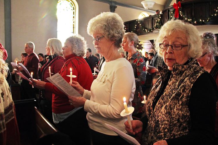 Lo How a Rose: annual candle-lighting ceremony honors Irish pioneers in ...