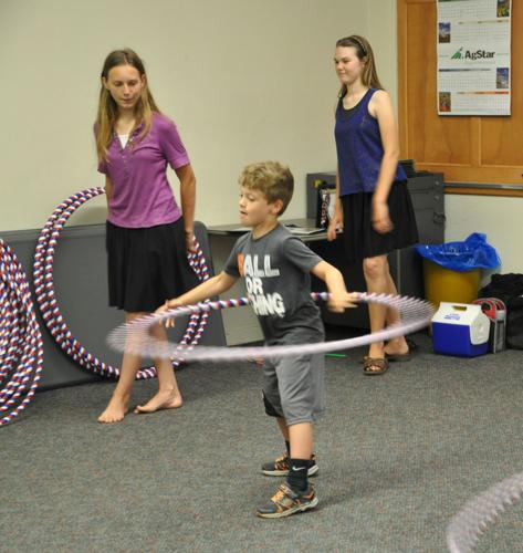 Family of hula enthusiasts dazzle children at Le Center Library | News ...