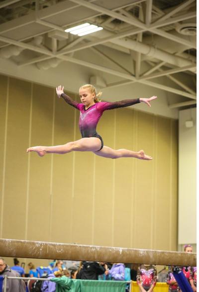 Scholes wins Level 7 vault championship title in statewide gymnastics ...