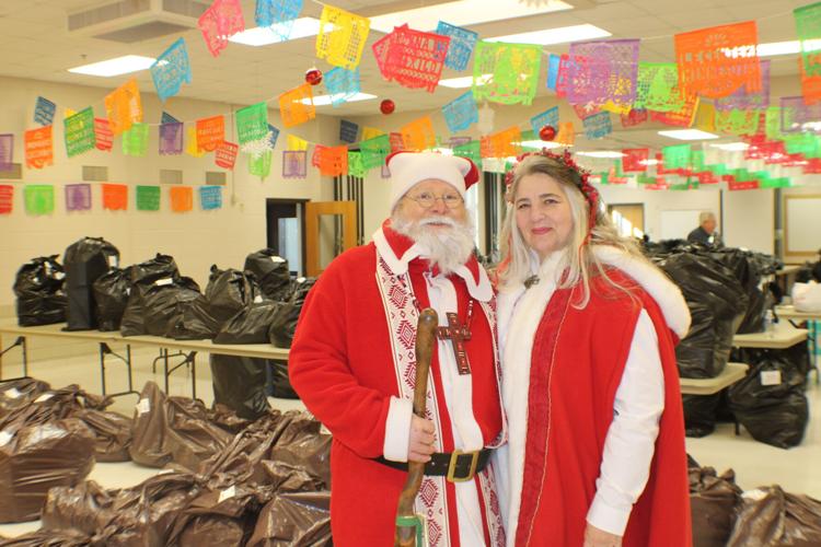 Santa Anonymous, Adopt-A-Family deliver gifts to hundreds of children ...