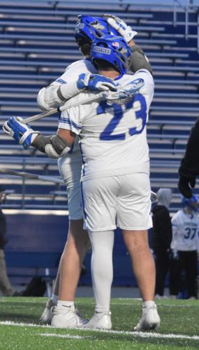 Huskies lacrosse wins 18-9 over Rochester for 1st win of season ...