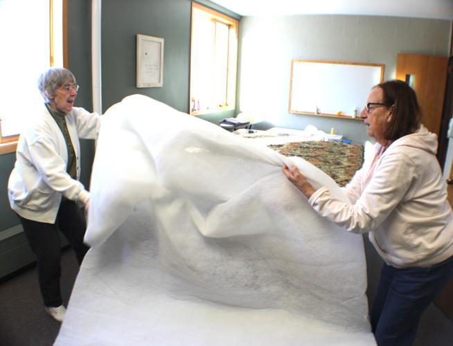 St. Peter church group comforts people in need with quilt donations ...