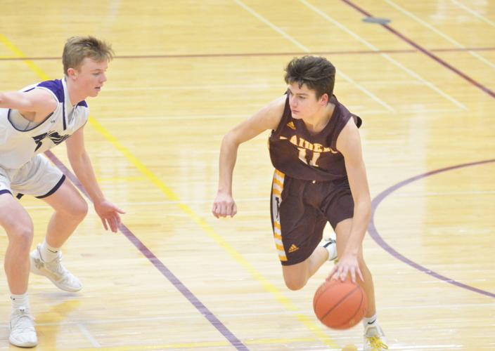 Inside work from guards and forwards alike lift Raider boys basketball ...