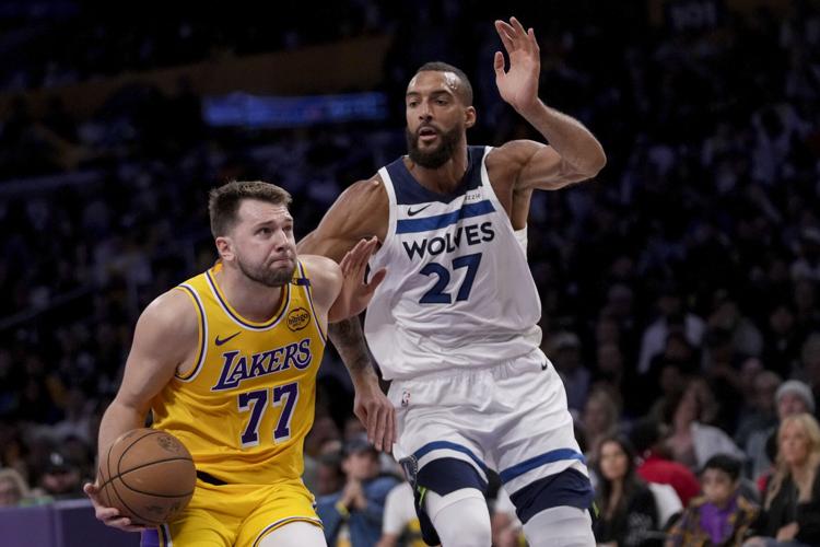 Luka scores 31, and the Lakers muscle past the Timberwolves 94-85 to ...
