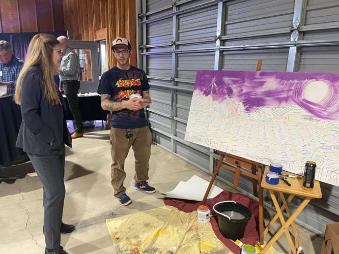 Emerging artist creates abstract landscape at Northfield Shares event ...