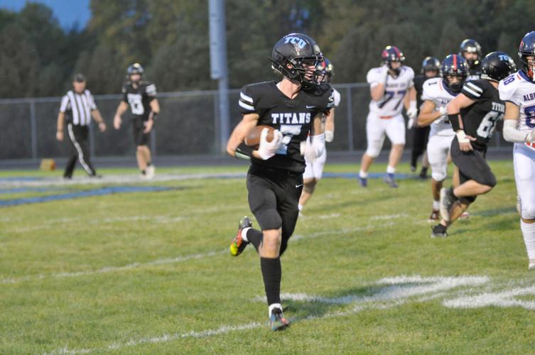 Titans overcome lightning delay to earning Homecoming victory over ...