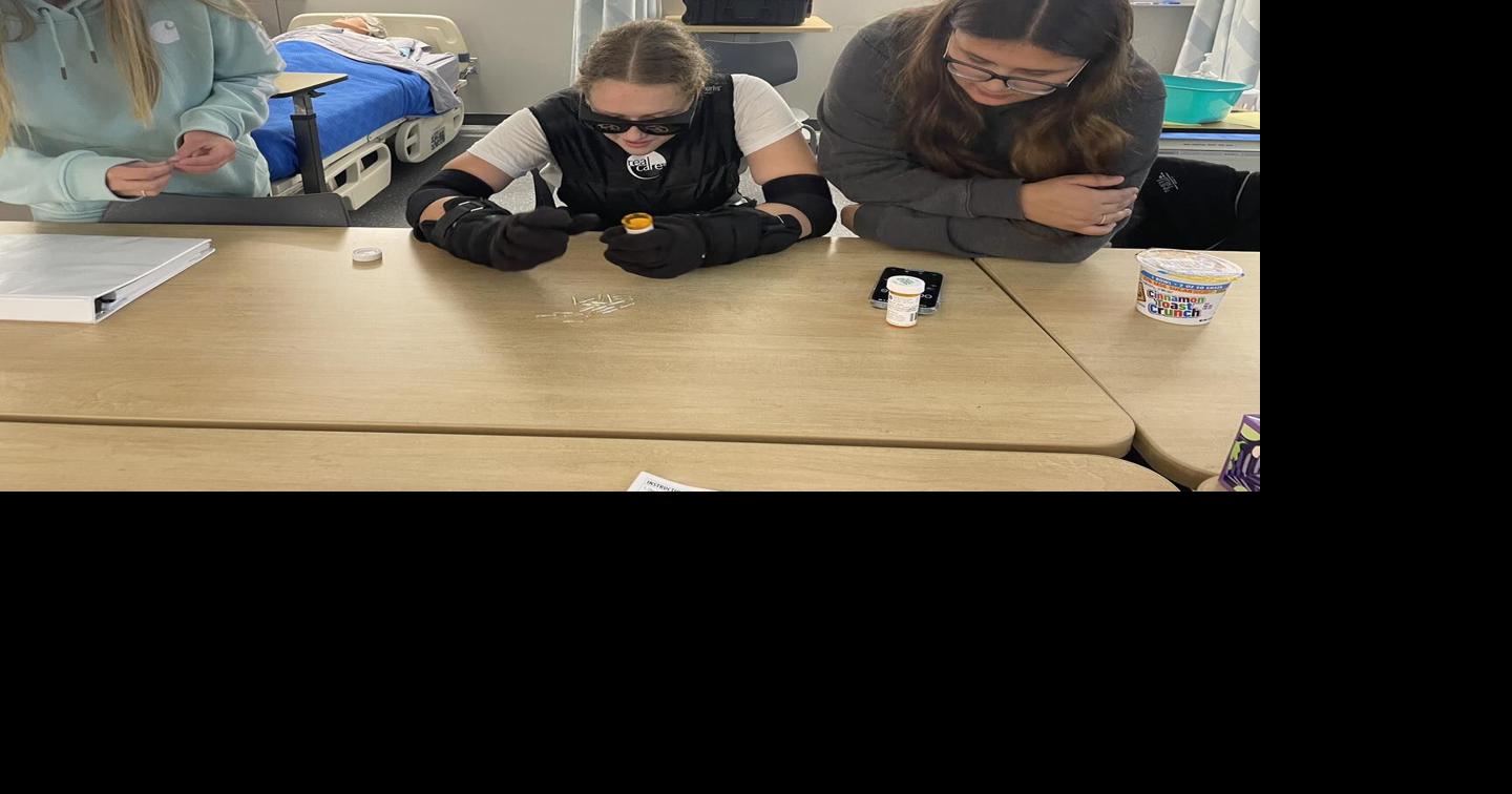 Nursing assistant students learn about aging, basic nursing skills ...