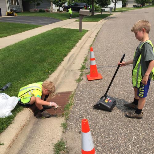 Storm drain stencils in Northfield raise awareness on river pollution ...