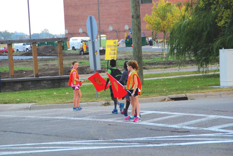 School crossing guards focus on safety and demonstrate leadership ...