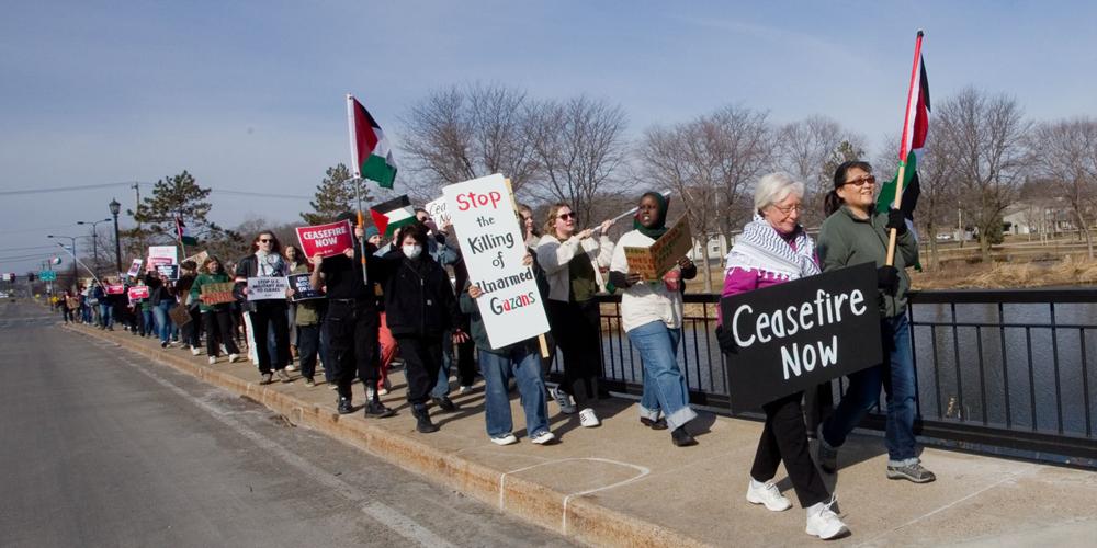 Supporters of a cease fire in Gaza march through Northfield Saturday ...