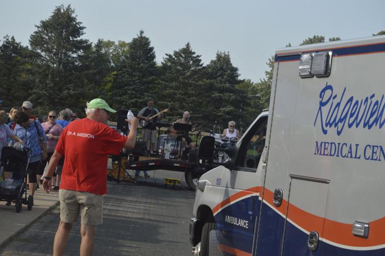 Neighbors and emergency responders share company in Night to Unite ...