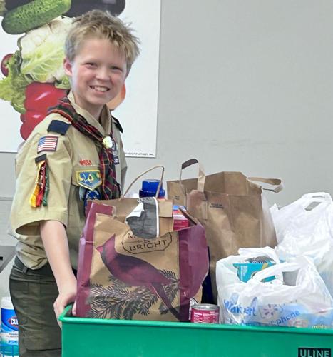 Cub Scouts collect 500 pounds of food and hygiene produces | Community ...