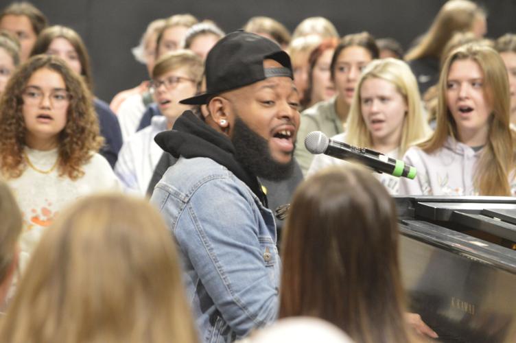 Gospel singer Trey McLaughlin helps St. Peter students find their voice ...