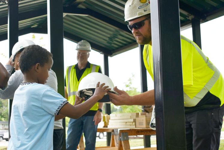 Met-Con helps STEAM students build picnic tables for new playground ...