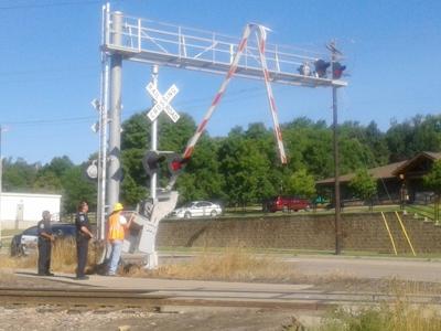 Broken railroad crossing arm in Northfield the result of semi driver in ...