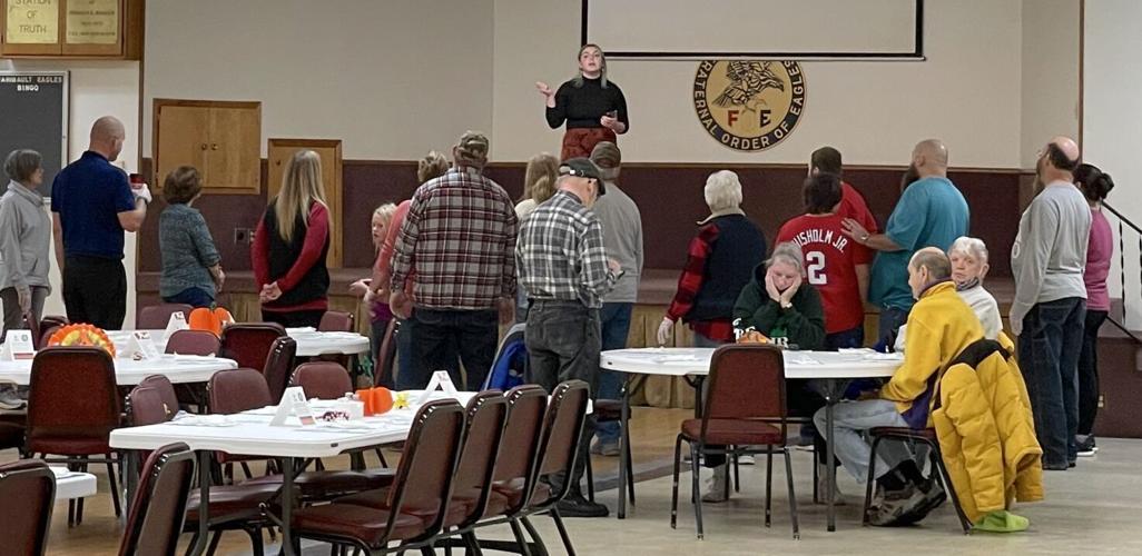 Families serving families a tradition at free community Thanksgiving ...