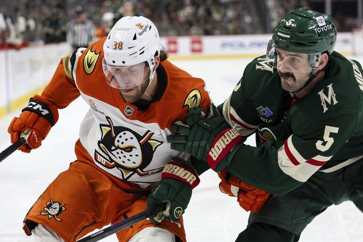 Wild clinch playoff spot by taking Ducks to OT on Eriksson Ek's tying ...