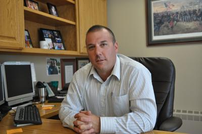 Le Sueur bank president and National Guard Col. Brian Pfarr announces ...