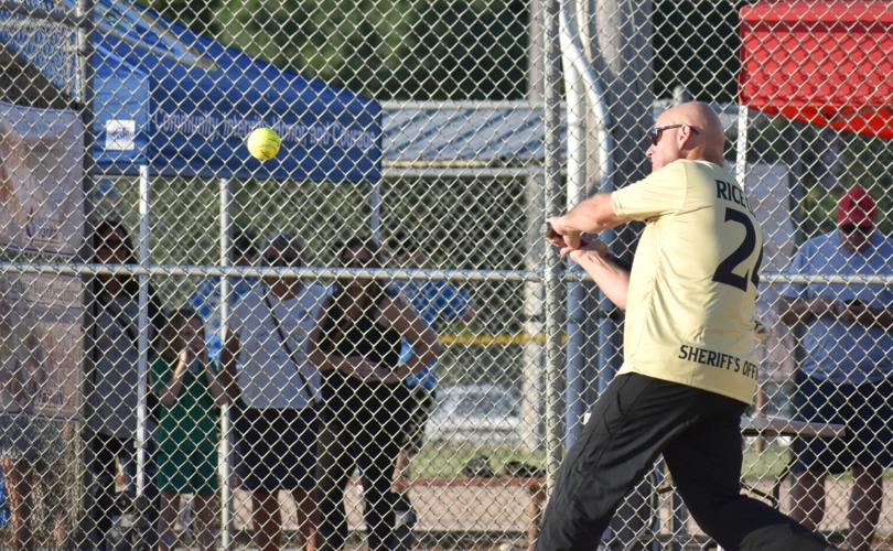 County defends title in charity softball tournament; over $1,300 raised ...