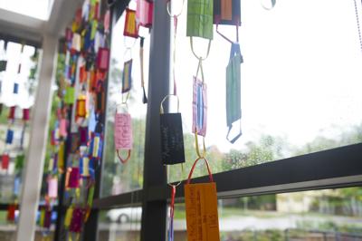 Middle school students create paper mask art installation | Community ...