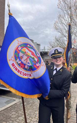 St. Peter's Roemhildt waves Legion flag at college football game ...