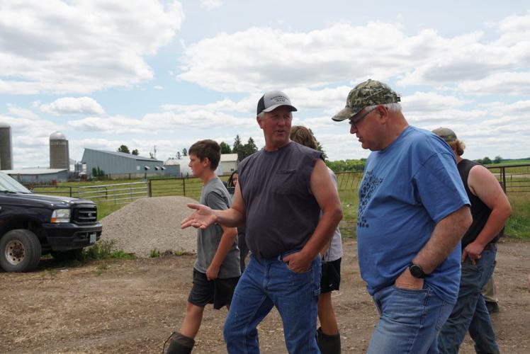 Gov. Walz visits local dairy farm amid plummeting milk prices | News ...