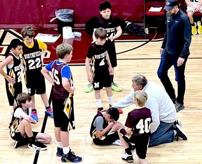 Raiders coach tends to injured player | Sports | southernminn.com