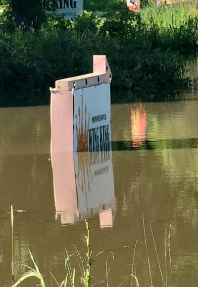 Wing King halts business as Minnesota River expands | News ...