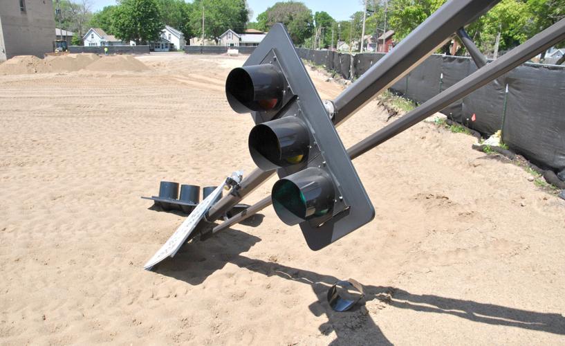 Dump truck rips stoplight from pole with lifted bed | News ...