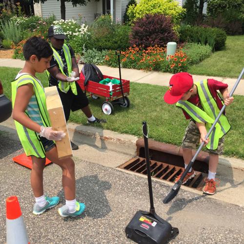 Storm drain stencils in Northfield raise awareness on river pollution ...